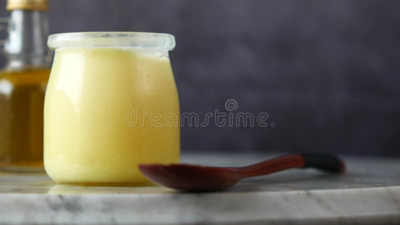 Homemade Ghee in Container on a Table , Stock Video - Video of ...