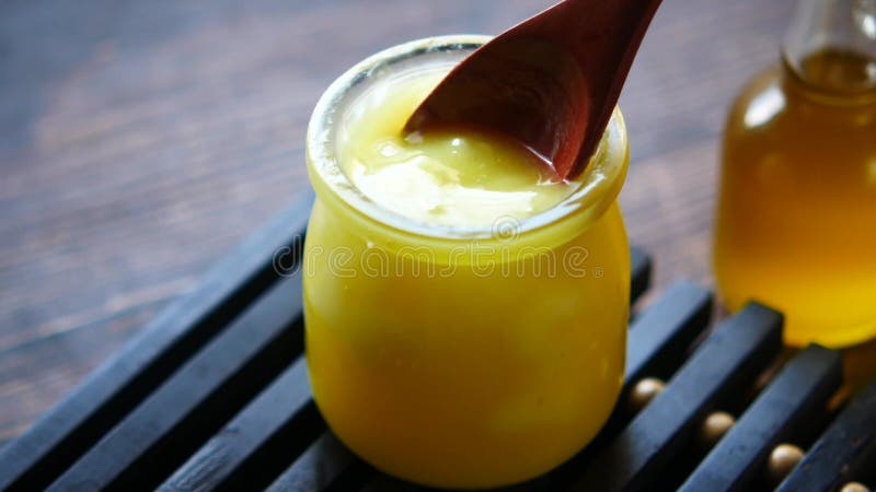 Homemade Ghee in Container on a Table , Stock Footage - Video of golden ...