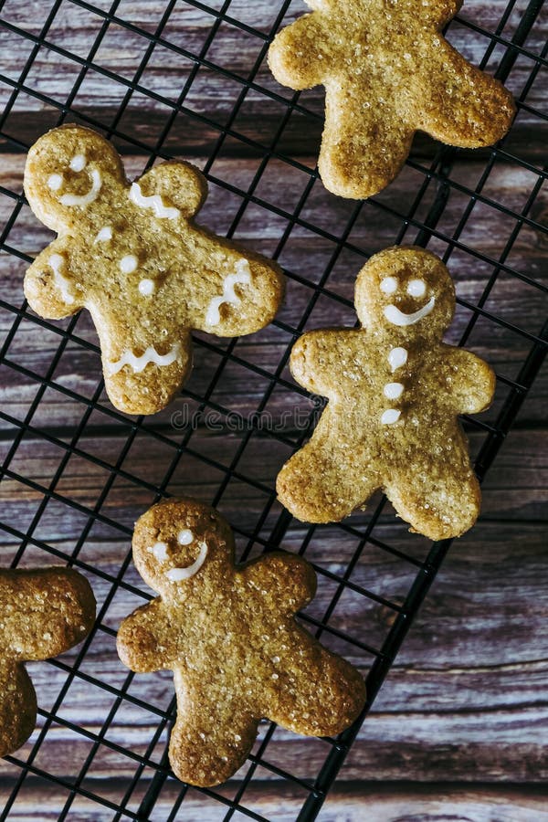 Homemade Gingerbread Men on a Black Grill Stock Image - Image of flour ...