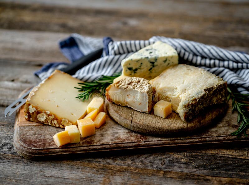 Homemade Goat Cheese on Craft Paper on an Old Rustic Table Stock Image ...