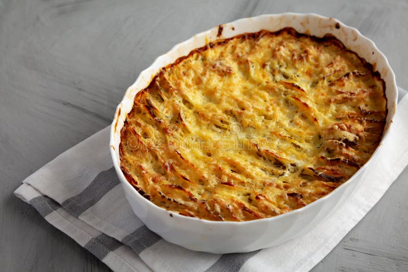 Homemade Hasselback Potato Gratin in a Dish, Side View. Copy Space ...