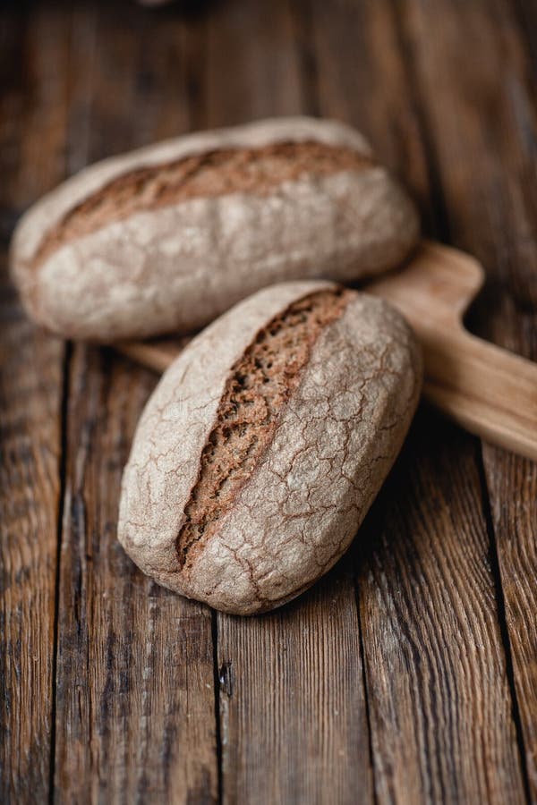 Homemade Hearth Bread on a Wooden Table. Stock Image - Image of rustic ...