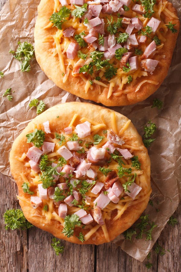 Homemade Hungarian Langos with Ham and Cheese Close-up. Vertical Stock ...