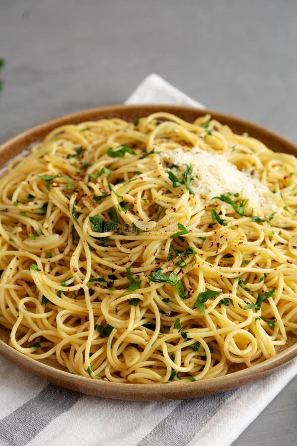 Homemade Italian Spaghetti Aglio E Olio on a Plate, Side View Stock ...