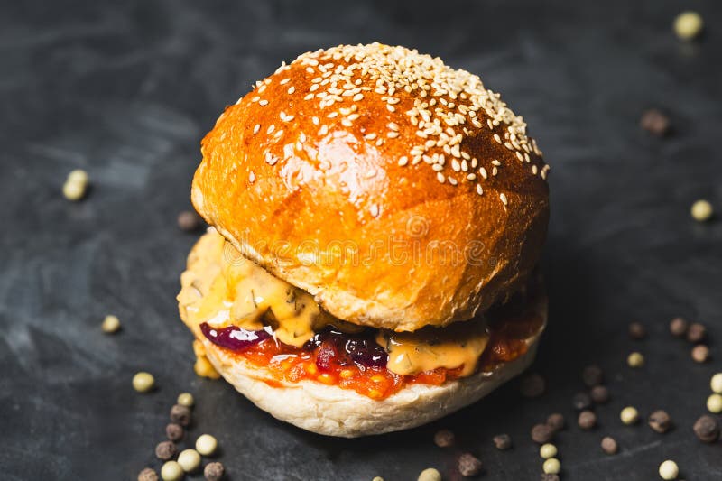 Juicy Burger with Vegetables and Meat on a Dark Background. Ai ...