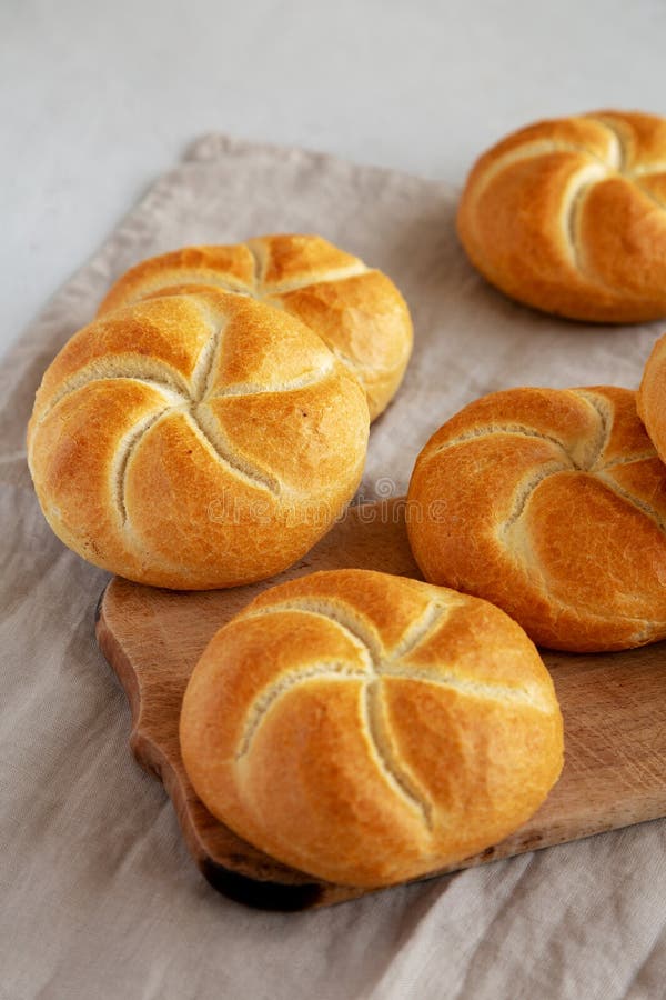 Homemade Kaiser Rolls on a Wooden Board, Side View Stock Photo - Image ...