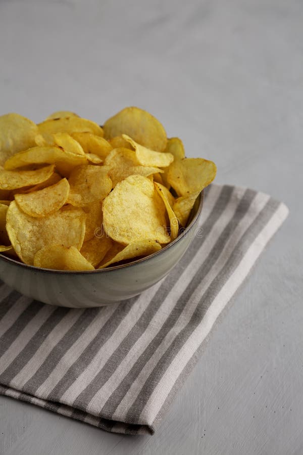 Homemade Kettle Cooked Potato Chips with Salt in a Bowl, Side View ...