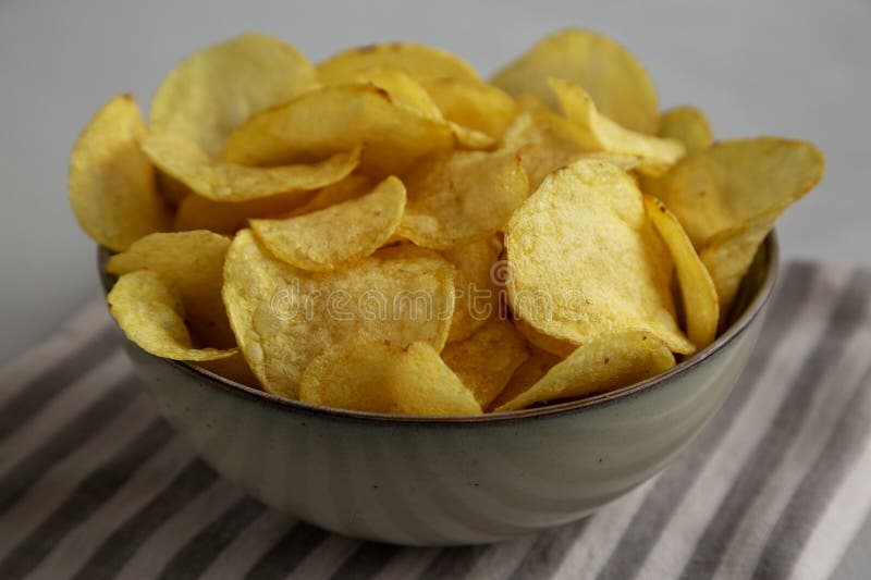 Homemade Kettle Cooked Potato Chips with Salt in a Bowl, Side View ...