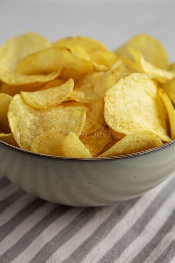 Homemade Kettle Cooked Potato Chips with Salt in a Bowl, Side View ...