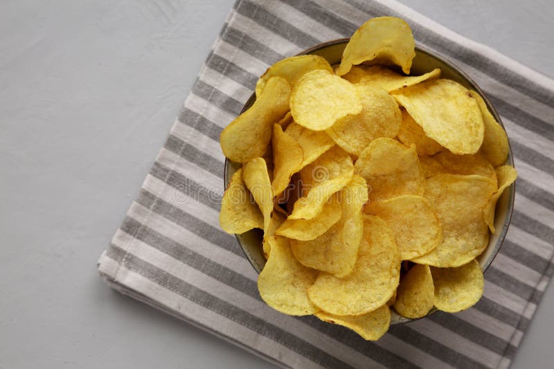 Homemade Kettle Cooked Potato Chips with Salt in a Bowl, Top View Stock ...