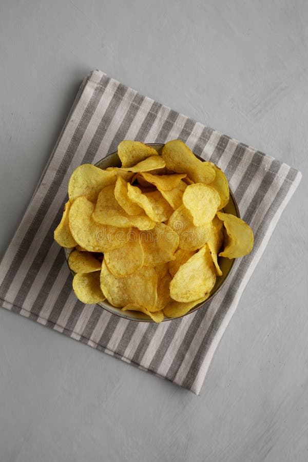 Homemade Kettle Cooked Potato Chips with Salt in a Bowl, Top View Stock ...