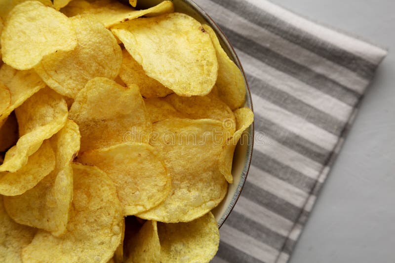 Homemade Kettle Cooked Potato Chips with Salt in a Bowl, Top View Stock ...