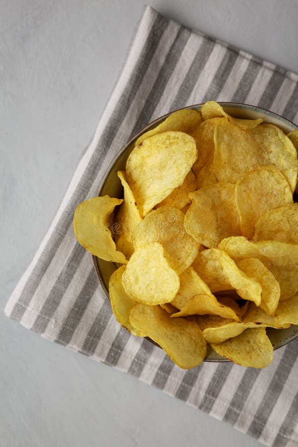 Homemade Kettle Cooked Potato Chips with Salt in a Bowl, Top View Stock ...