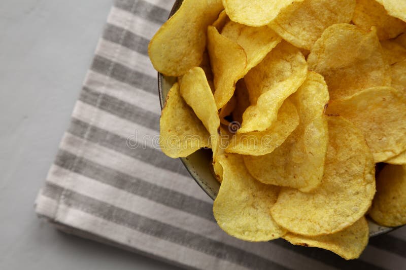 Homemade Kettle Cooked Potato Chips with Salt in a Bowl, Top View Stock ...