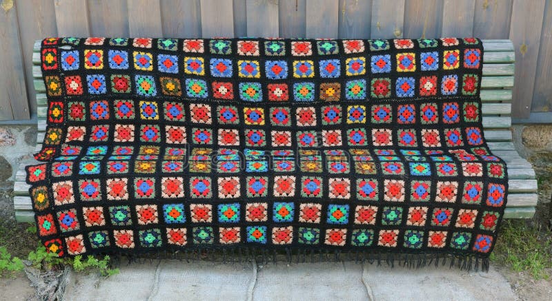 Homemade Knitted Old Bedspread on a Wooden Bench Stock Photo - Image of ...