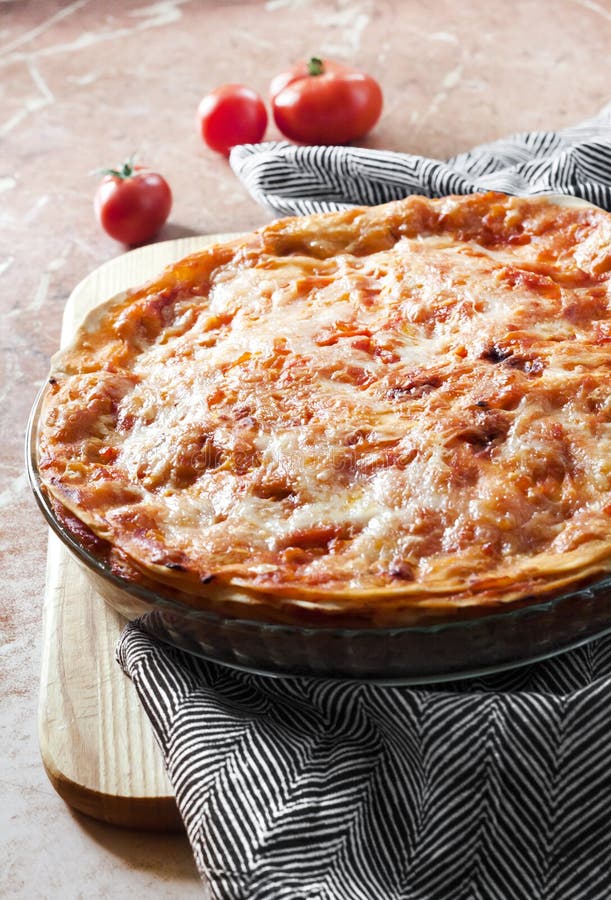 Homemade Lasagna in Round Glass Baking Dish Stock Image - Image of ...