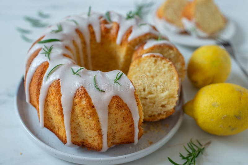 Homemade Lemon Bundt Cake with Sugar Icing Stock Photo - Image of piece ...