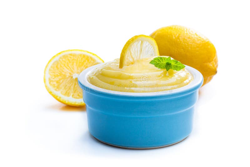 Homemade Lemon Curd in Blue Ceramic Bowl Isolated on White Stock Photo ...