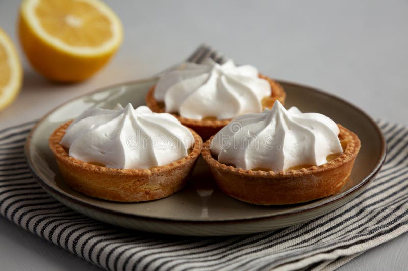 Homemade Lemon Tartlets on a Plate, Low Angle View Stock Photo - Image ...