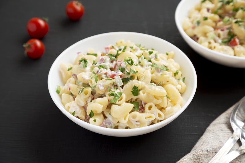 Homemade Macaroni Salad in a White Bowl on a Black Background, Side ...