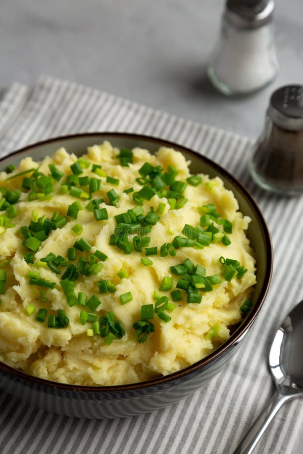 Homemade Mashed Potatoes with Chives in a Bowl, Side View Stock Photo ...