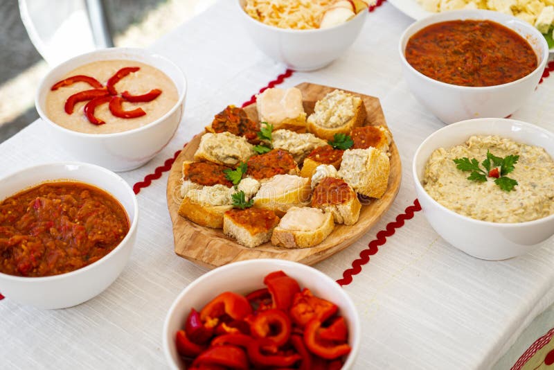 Homemade Mashed Vegetable Paste in Bowls and on Bread at a Local Brunch ...