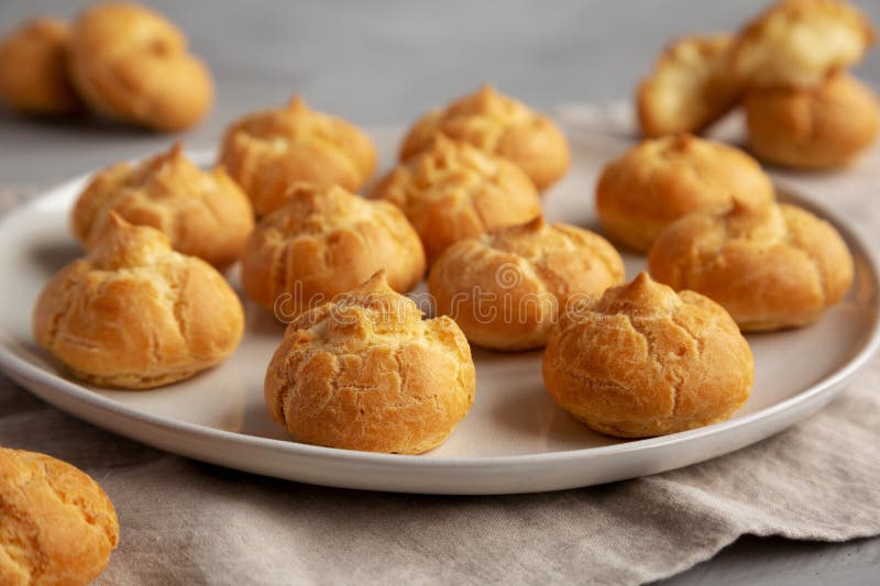Homemade Mini Cream Puffs on a Plate, Low Angle View Stock Image ...