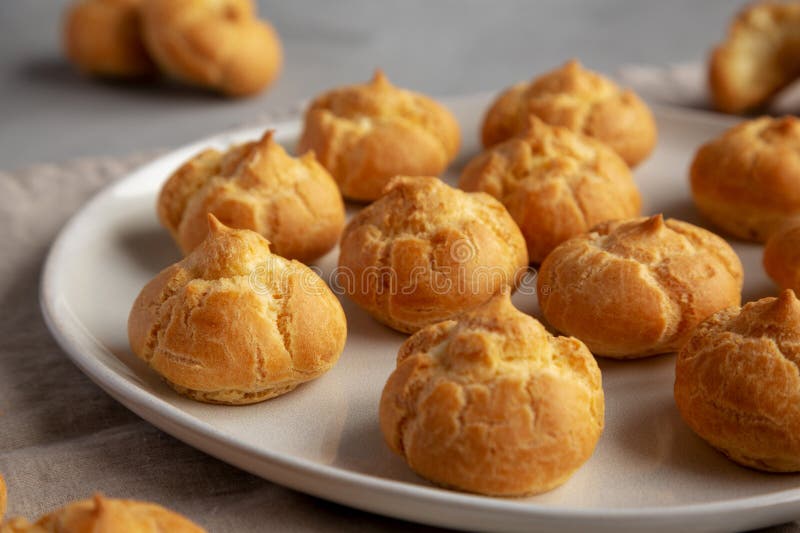 Homemade Mini Cream Puffs on a Plate, Low Angle View. Close-up Stock ...