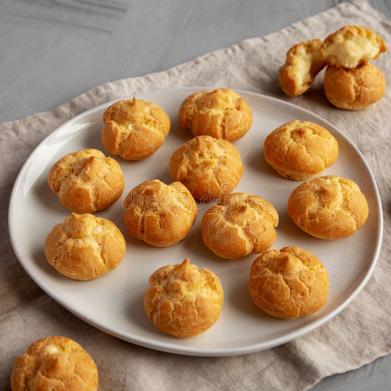 Homemade Mini Cream Puffs on a Plate, Side View Stock Photo - Image of ...