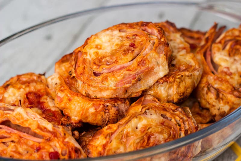 Homemade Mini Pizza Buns Topped with Tomato Sauce, Ham and Cheese Stock ...