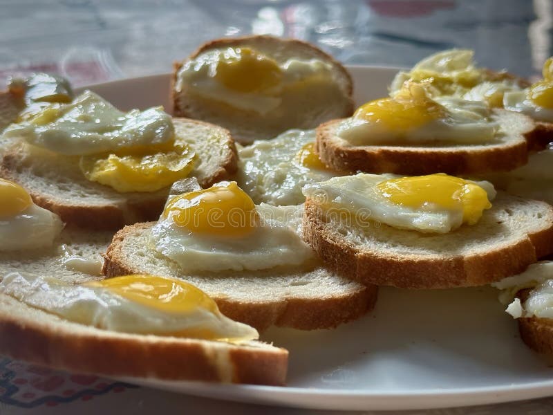 Homemade Mini Sunny-Side-Up Eggs on Toast a Delightful Breakfast Presentation Stock Image ...