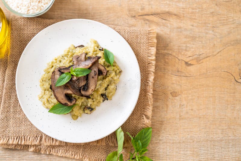 Mushroom Risotto with Pesto and Cheese Stock Image - Image of culinary ...
