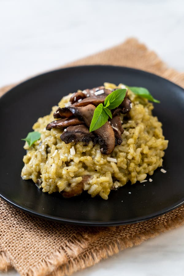 Mushroom Risotto with Pesto and Cheese Stock Image - Image of ...