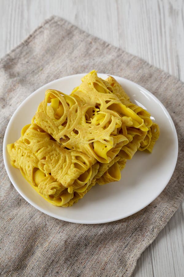 Homemade Net Crepe Roti Jala on a White Plate, Side View Stock Image ...