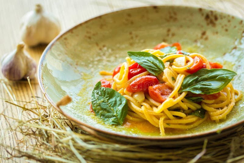 Homemade Pasta with Basil and Tomatoes Stock Image - Image of basil ...