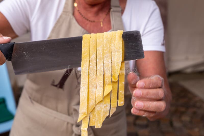 Homemade Pasta with Rolling Pin Tagliatelle Pasta and Agnolotti Stock ...