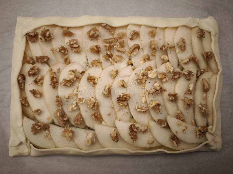 Rustic Pear Pastry with Walnut Topping, Baked on Golden Flaky Crust in ...