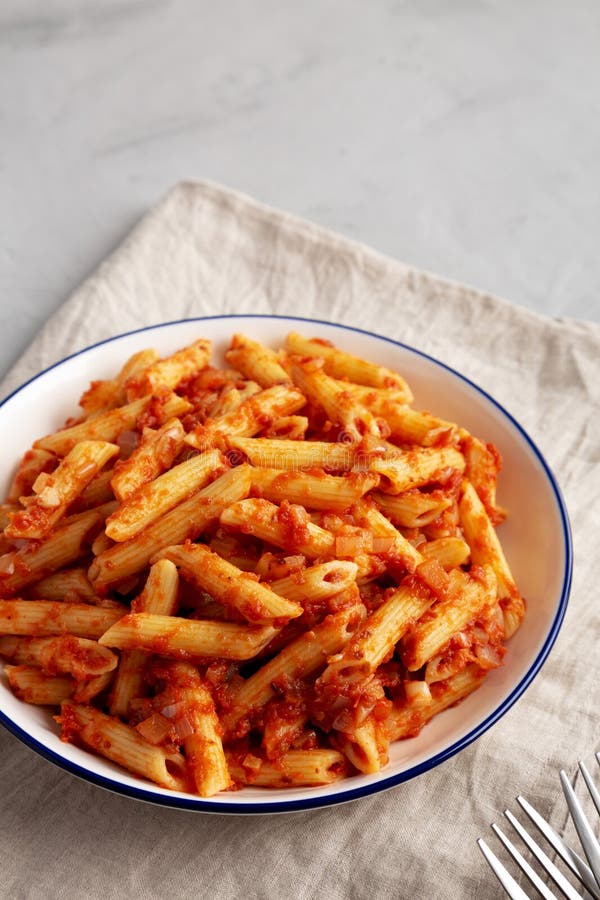 Homemade Penne with Tomato Sauce on a Plate, Side View. Space for Text ...
