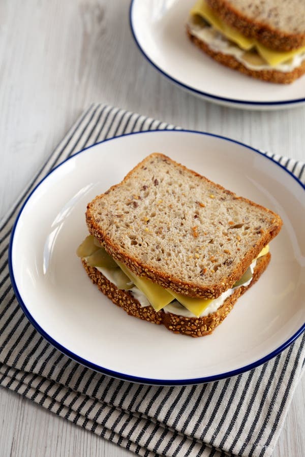 Homemade Pickle Sandwich with Mayo and Cheese on a Plate, Side View ...