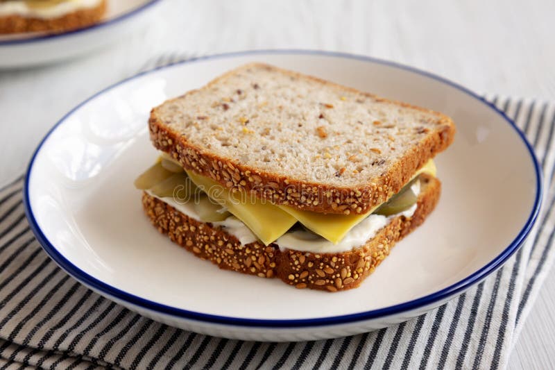 Homemade Pickle Sandwich with Mayo and Cheese on a Plate, Side View ...
