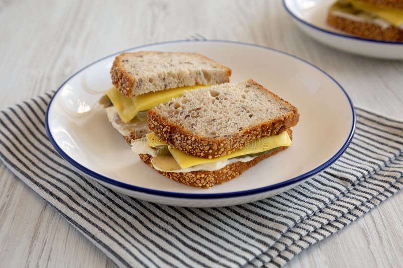 Homemade Pickle Sandwich with Mayo and Cheese on a Plate, Side View ...