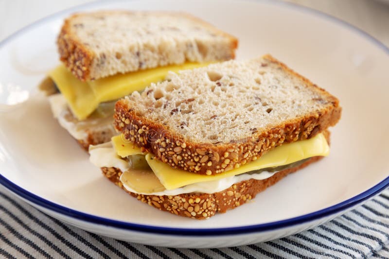 Homemade Pickle Sandwich with Mayo and Cheese on a Plate, Side View ...