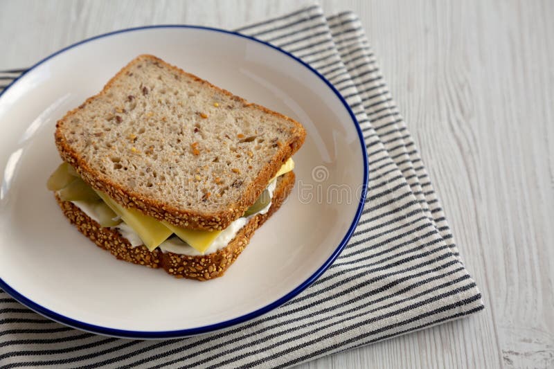 Homemade Pickle Sandwich with Mayo and Cheese on a Plate, Side View ...