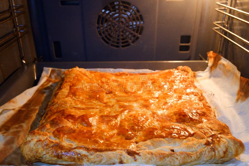 Homemade Pie Cooking Inside an Oven with Puff Pastry Stock Photo ...