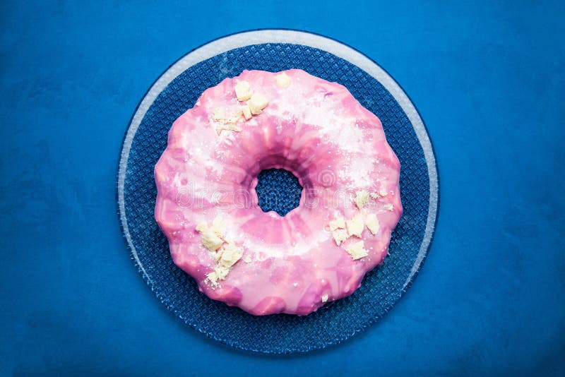Homemade Pie with Pink Icing on a Blue Table, Top View, Flat Lay Stock ...