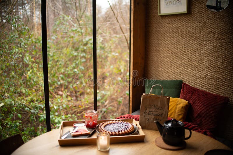 Homemade Pie on Table in Log Cabin. Breakfast in Forest House Stock ...