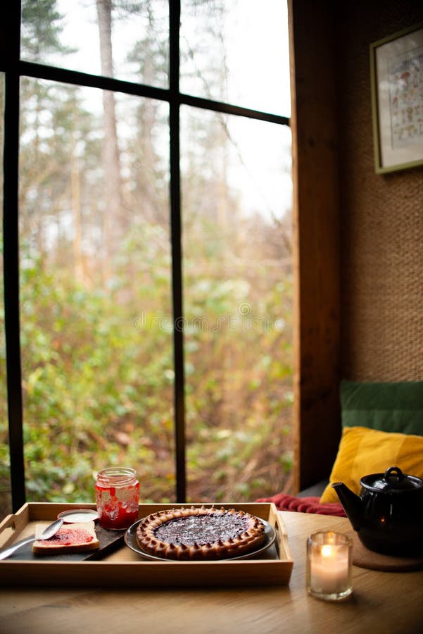 Homemade Pie on Table in Log Cabin. Breakfast in Forest House Stock ...