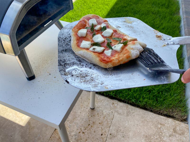 Homemade Pizza Being Cooked on Wood Fired Oven Stock Image - Image of ...