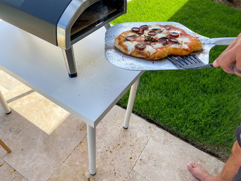 Homemade Pizza Being Cooked on Wood Fired Oven Stock Photo - Image of ...