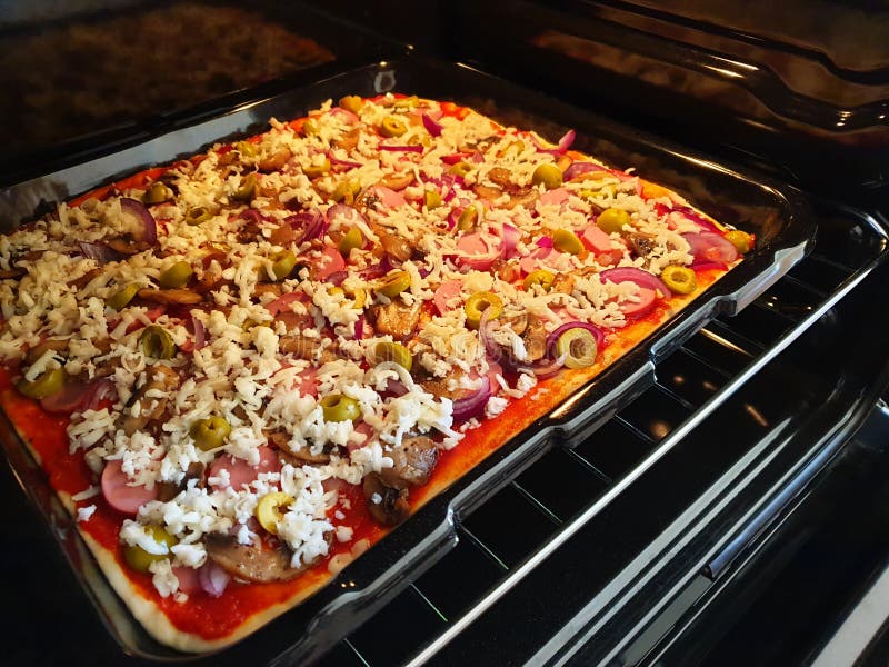 Homemade Pizza in the Baking Stock Image - Image of cook, dough: 187840271